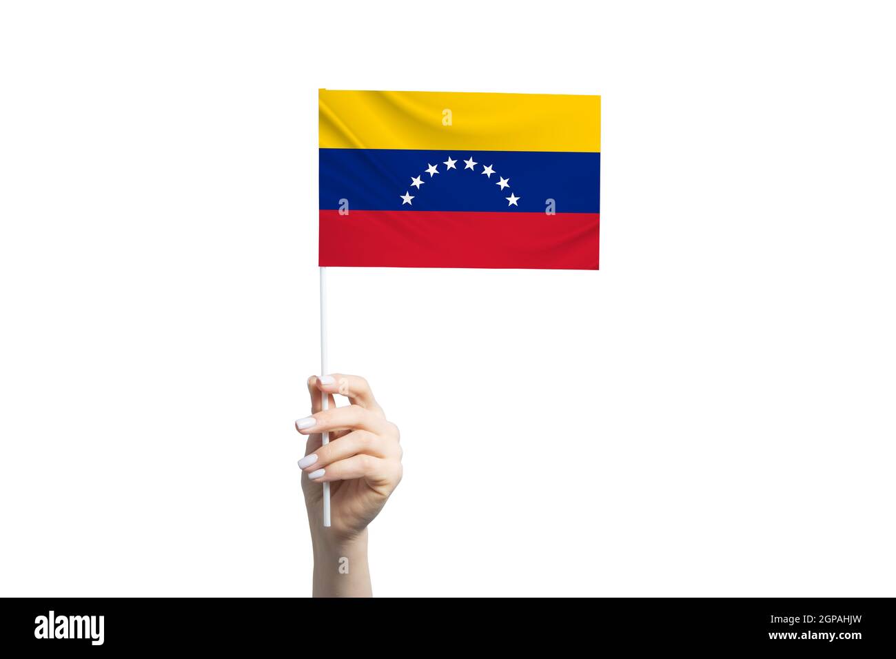 Beautiful female hand holding Venezuela flag, isolated on white ...