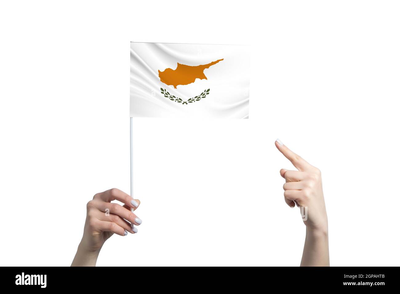 A beautiful female hand holds a Cyprus flag to which she shows the ...