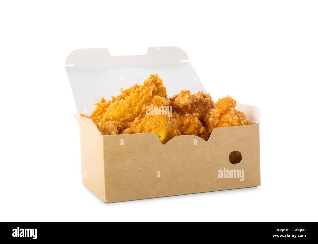 Paper box with crunchy popcorn chicken on white background Stock Photo ...