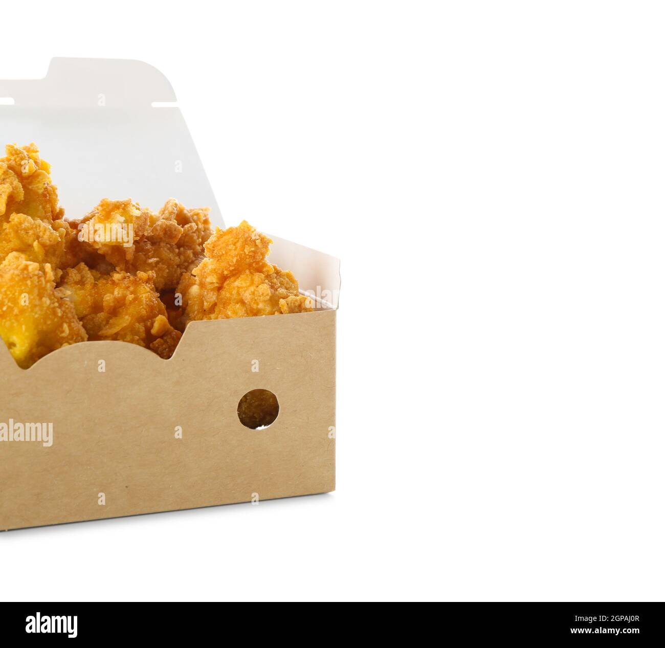 Paper box with tasty popcorn chicken on white background Stock Photo ...