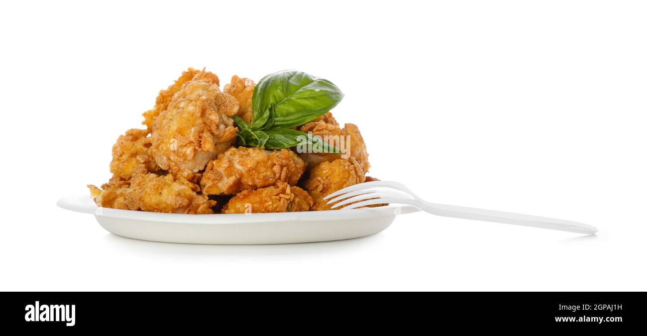 Plate with popcorn chicken on white background Stock Photo - Alamy
