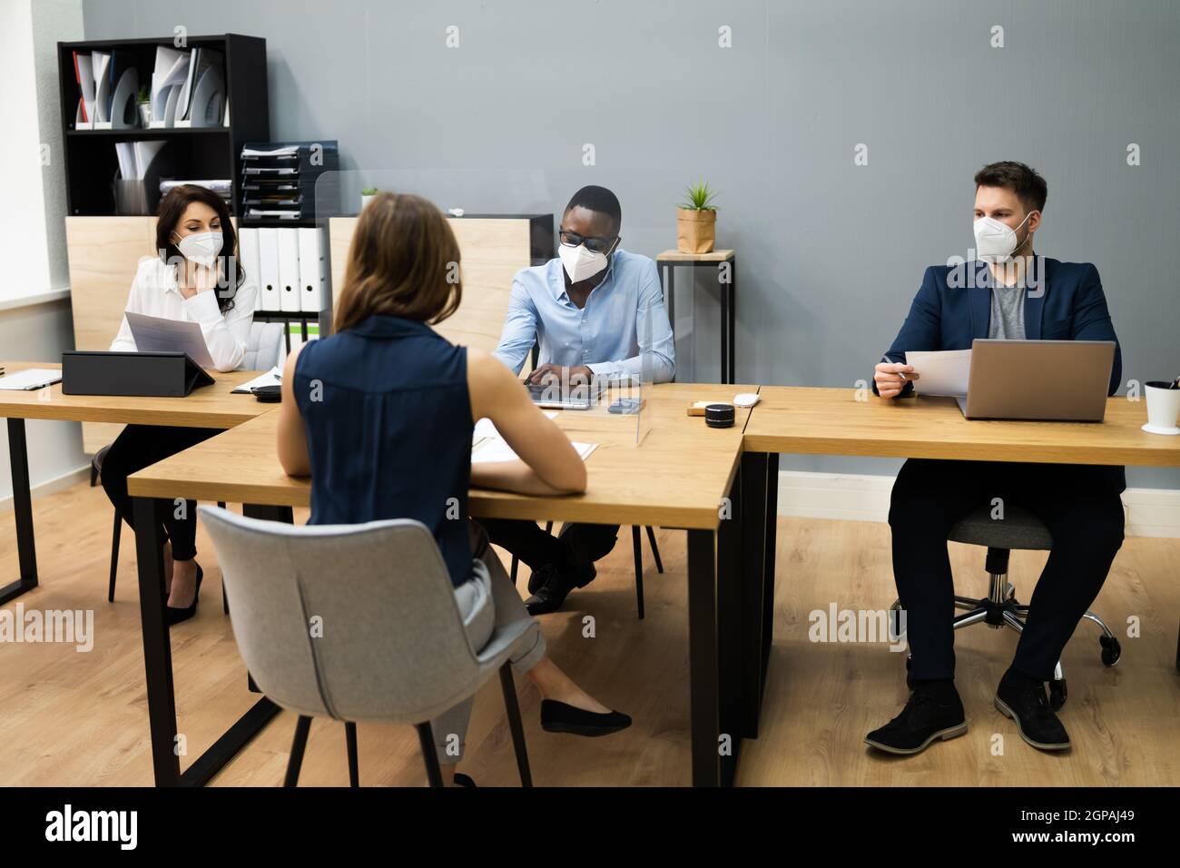 Business Manager Job Interview Talking In Face Mask Stock Photo - Alamy