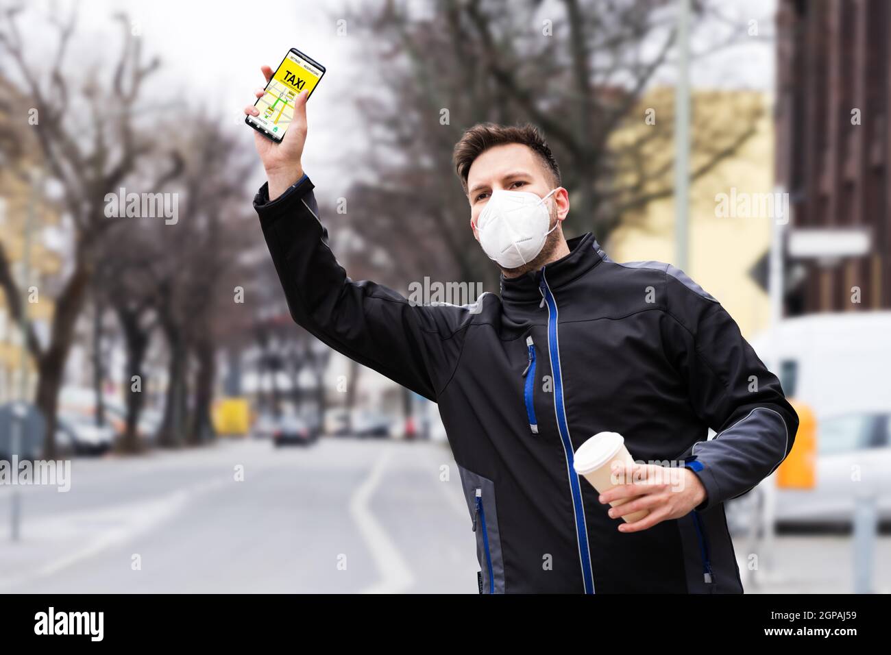 Calling Taxi Cab Using Phone App. Hailing And Stopping Using Arm Stock ...