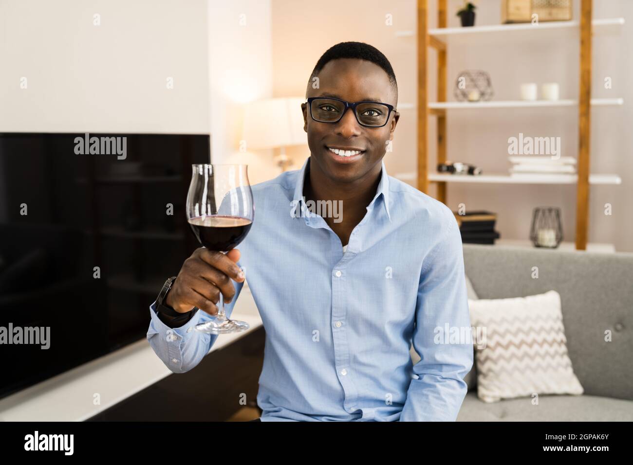 Man Drinking Wine Alcohol In House Room Stock Photo - Alamy