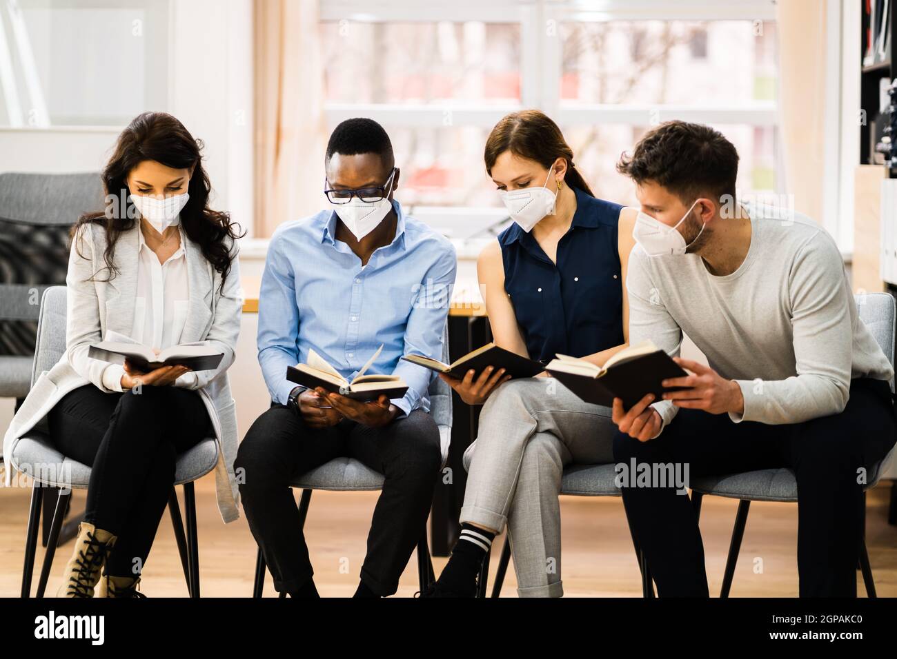 Group Bible Study And Discipleship. People Reading Stock Photo - Alamy