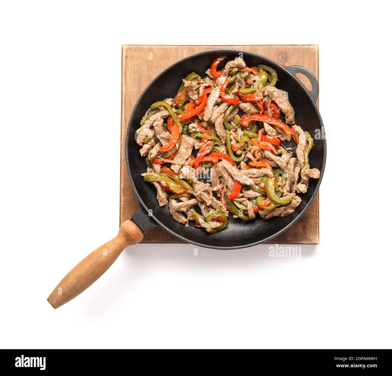 Frying pan with traditional Mexican Fajita on white background Stock ...