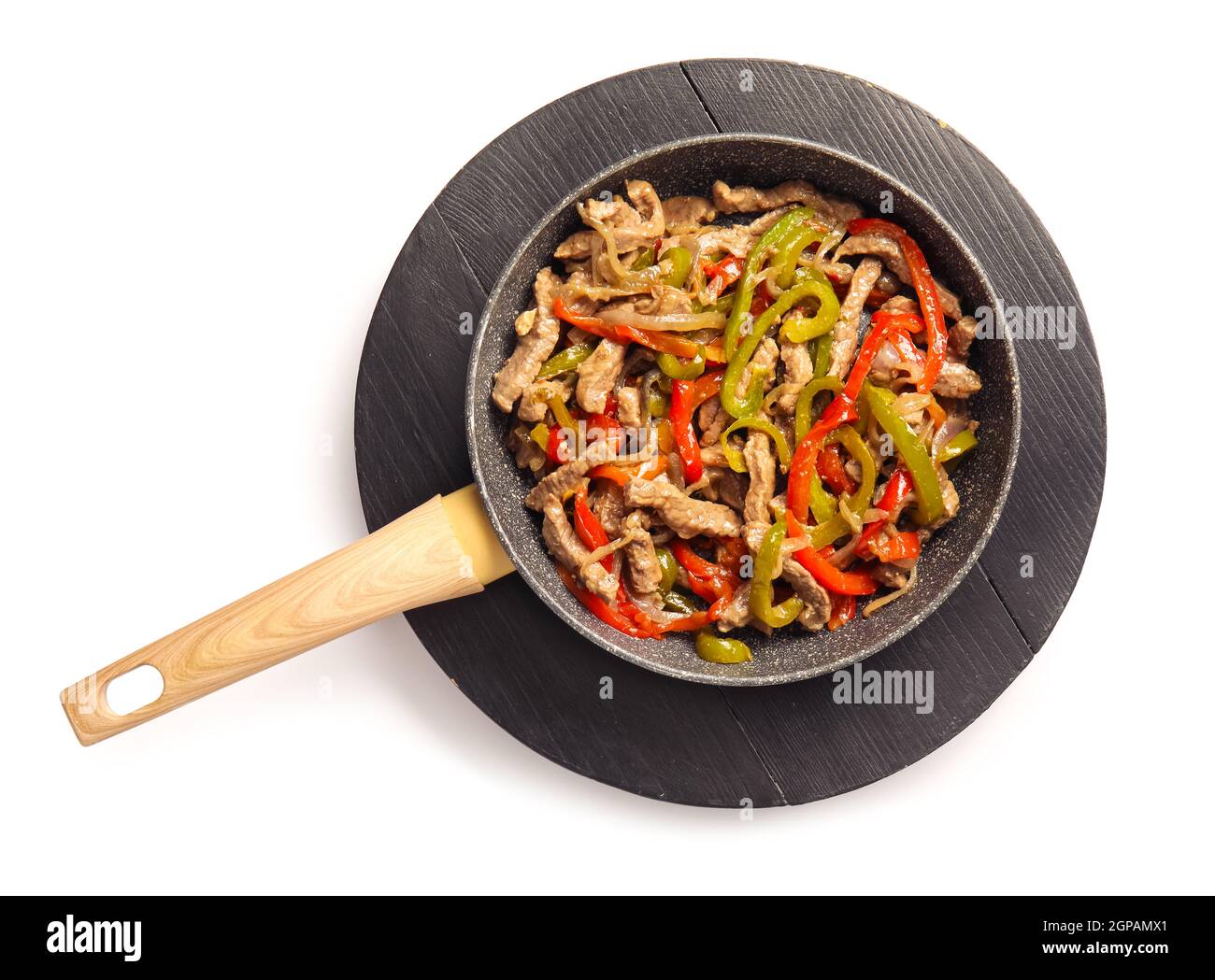 Frying pan with tasty traditional Mexican Fajita on white background ...