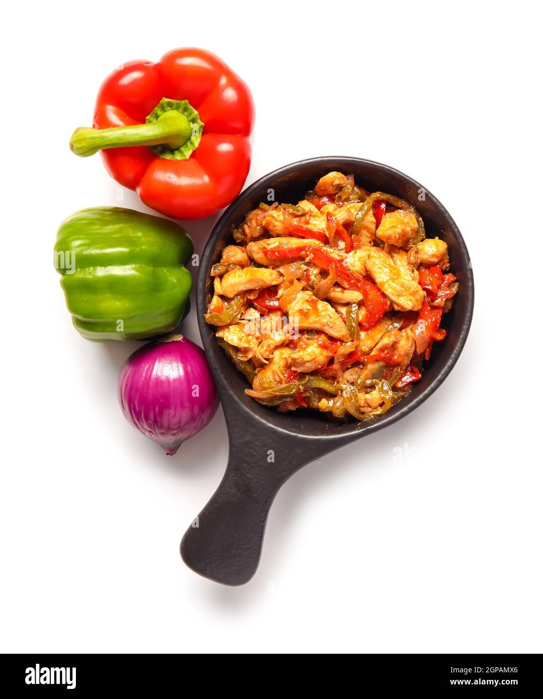 Frying pan with delicious traditional Mexican chicken Fajita on white ...