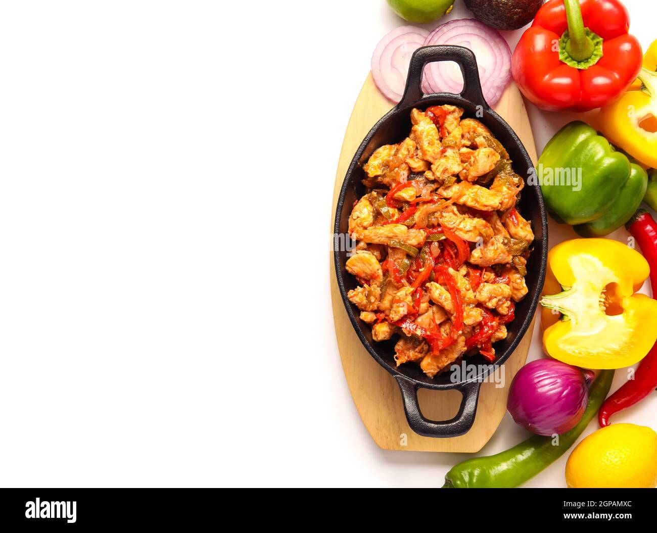 Frying pan with delicious traditional Mexican chicken Fajita and ...