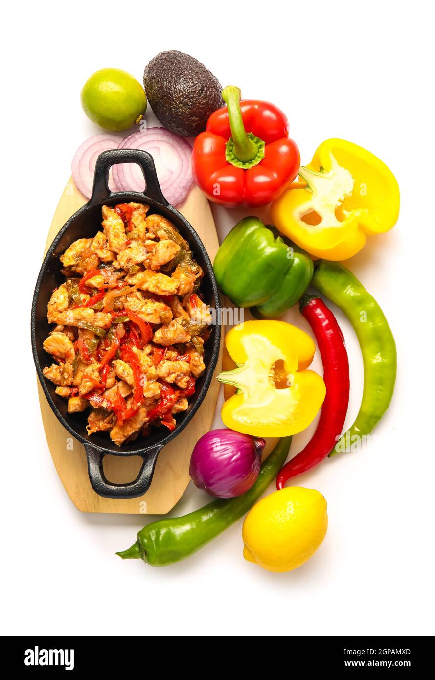 Frying pan with tasty traditional Mexican chicken Fajita and vegetables ...