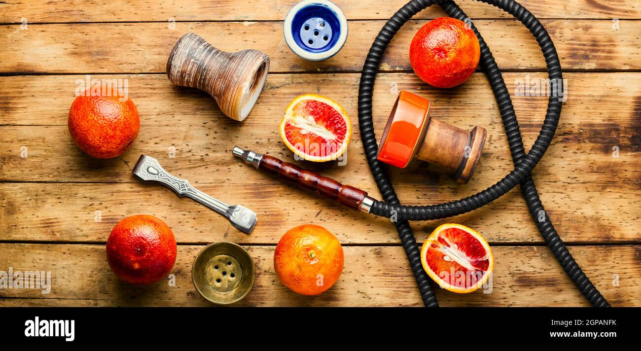 Egyptian hookah or shisha with tobacco with grapefruit aroma.East smoking kalian Stock Photo - Alamy