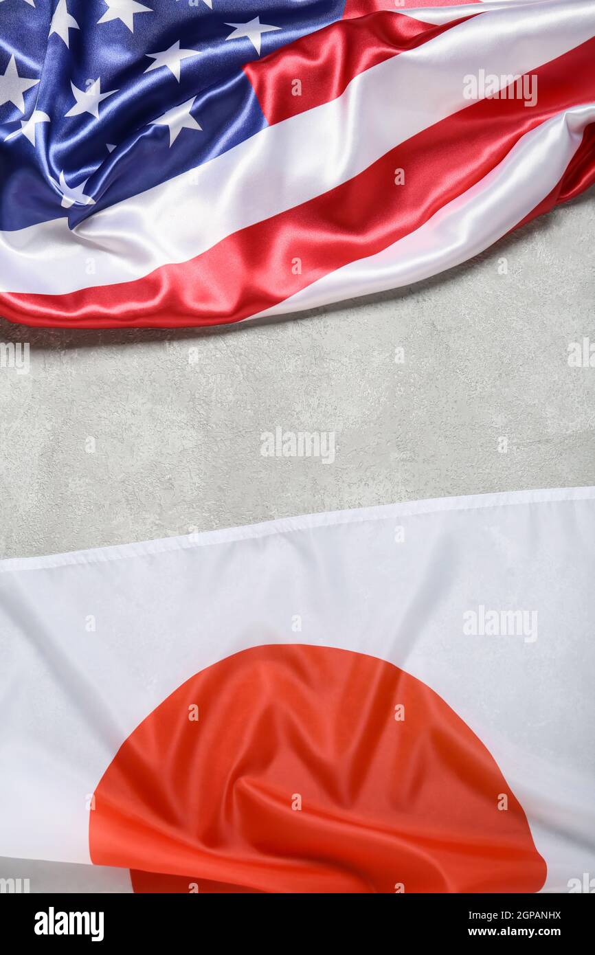 Flags of Japan and USA on light background Stock Photo - Alamy