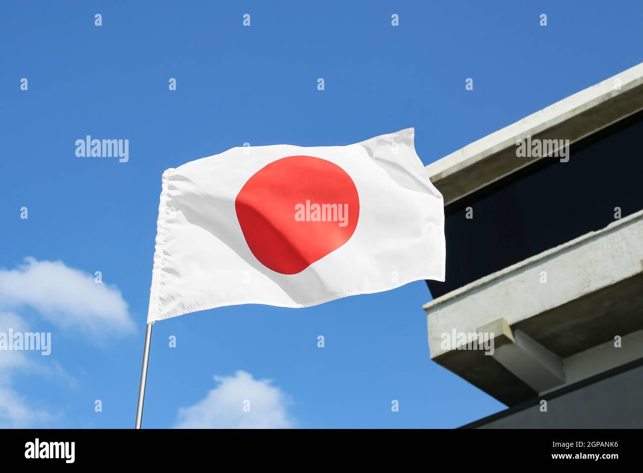 Waving flag of Japan outdoors Stock Photo - Alamy