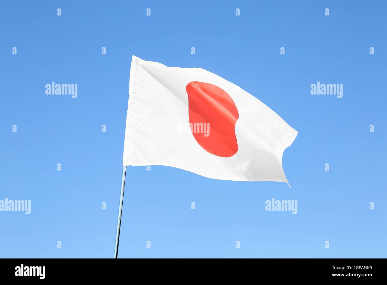 Waving flag of Japan outdoors Stock Photo - Alamy