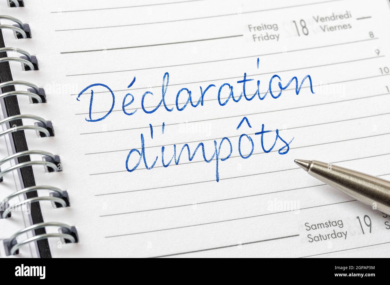 Daily planner with the entry Tax reporting in french - Déclaration d ...