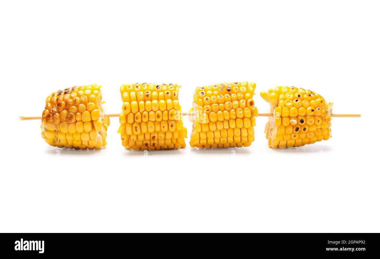 Pieces of delicious grilled Mexican street corn on white background ...