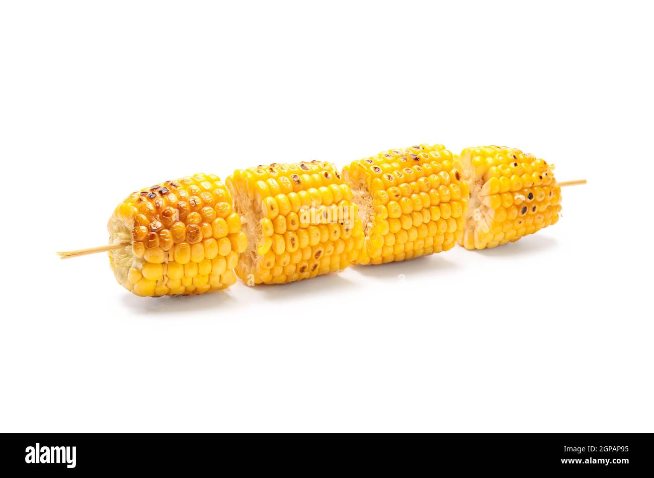Pieces of delicious grilled Mexican street corn on white background ...
