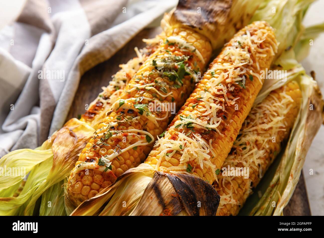 Delicious Elote Mexican Street Corn on table, closeup Stock Photo - Alamy