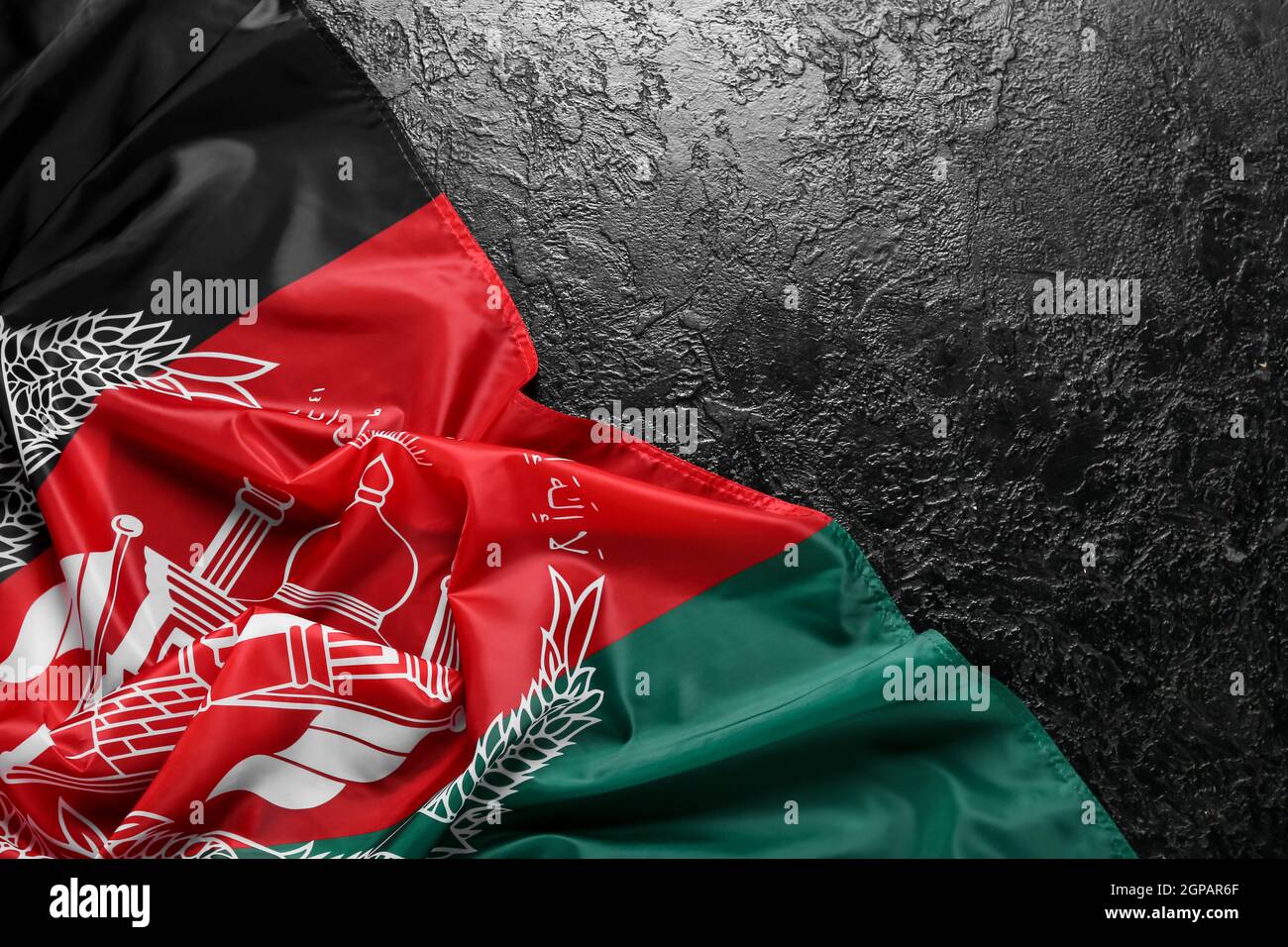 National Afghanistan flag on black background, closeup Stock Photo - Alamy