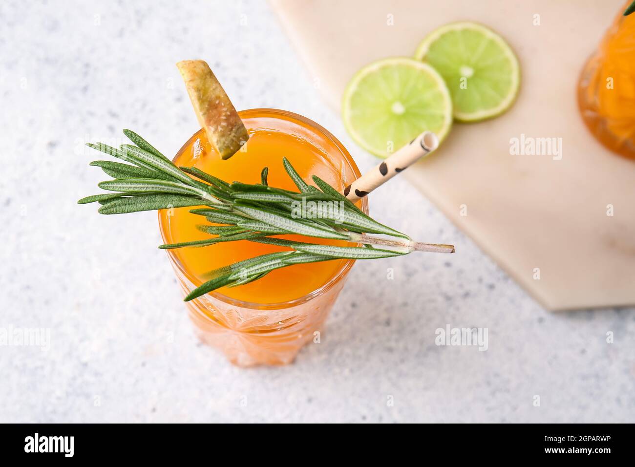 Glass of cold melon cocktail on light background Stock Photo - Alamy