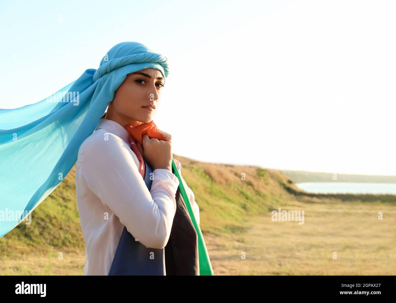 Muslim woman with flag of Afghanistan outdoors Stock Photo - Alamy