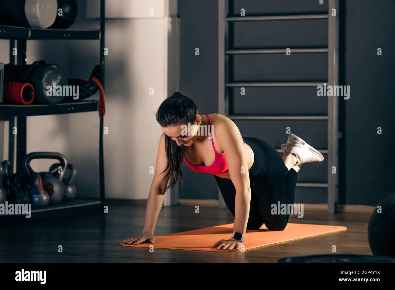 women push-ups during fitness exercises Stock Photo - Alamy