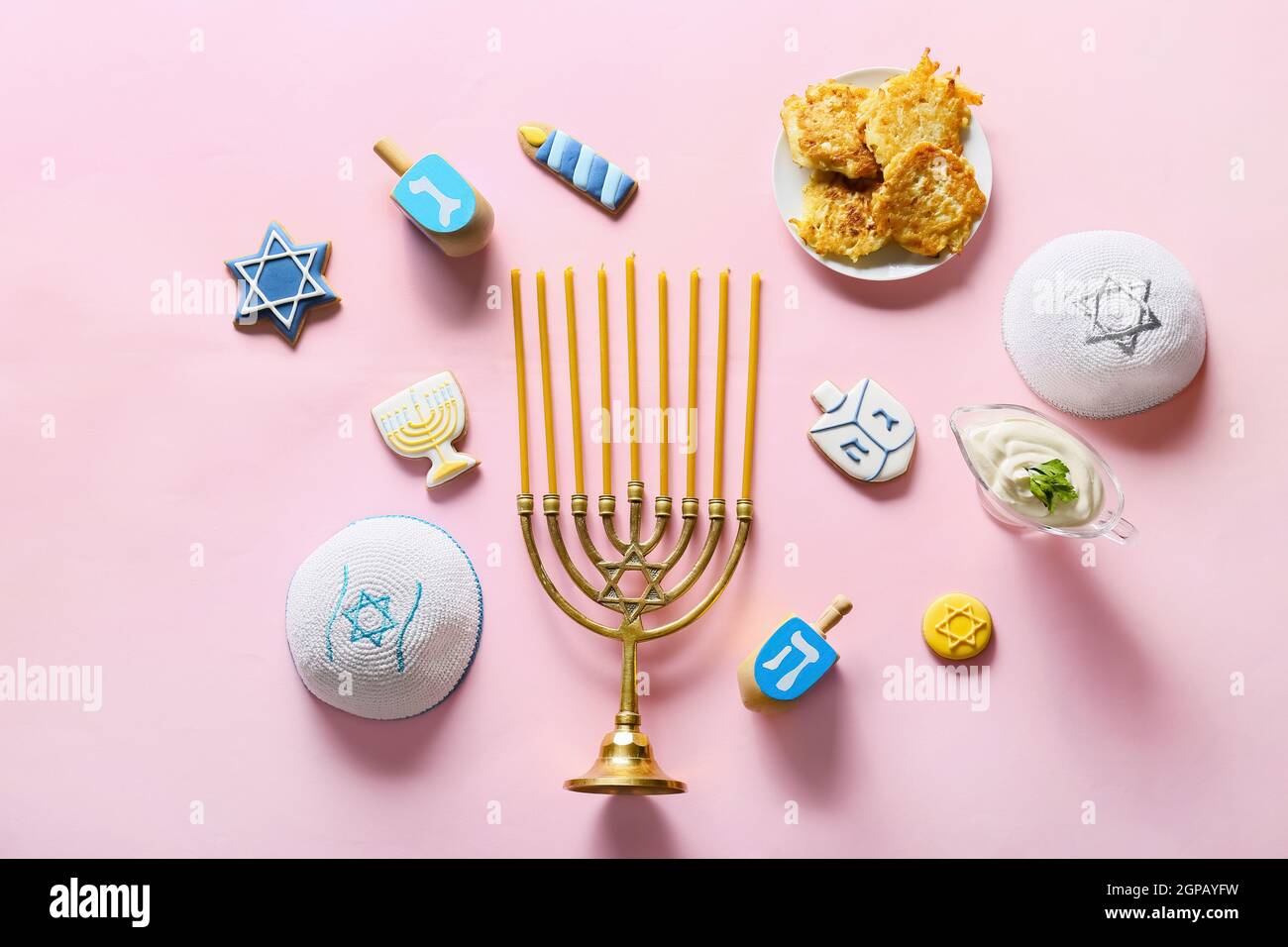 Different symbols of Hanukkah on color background Stock Photo - Alamy