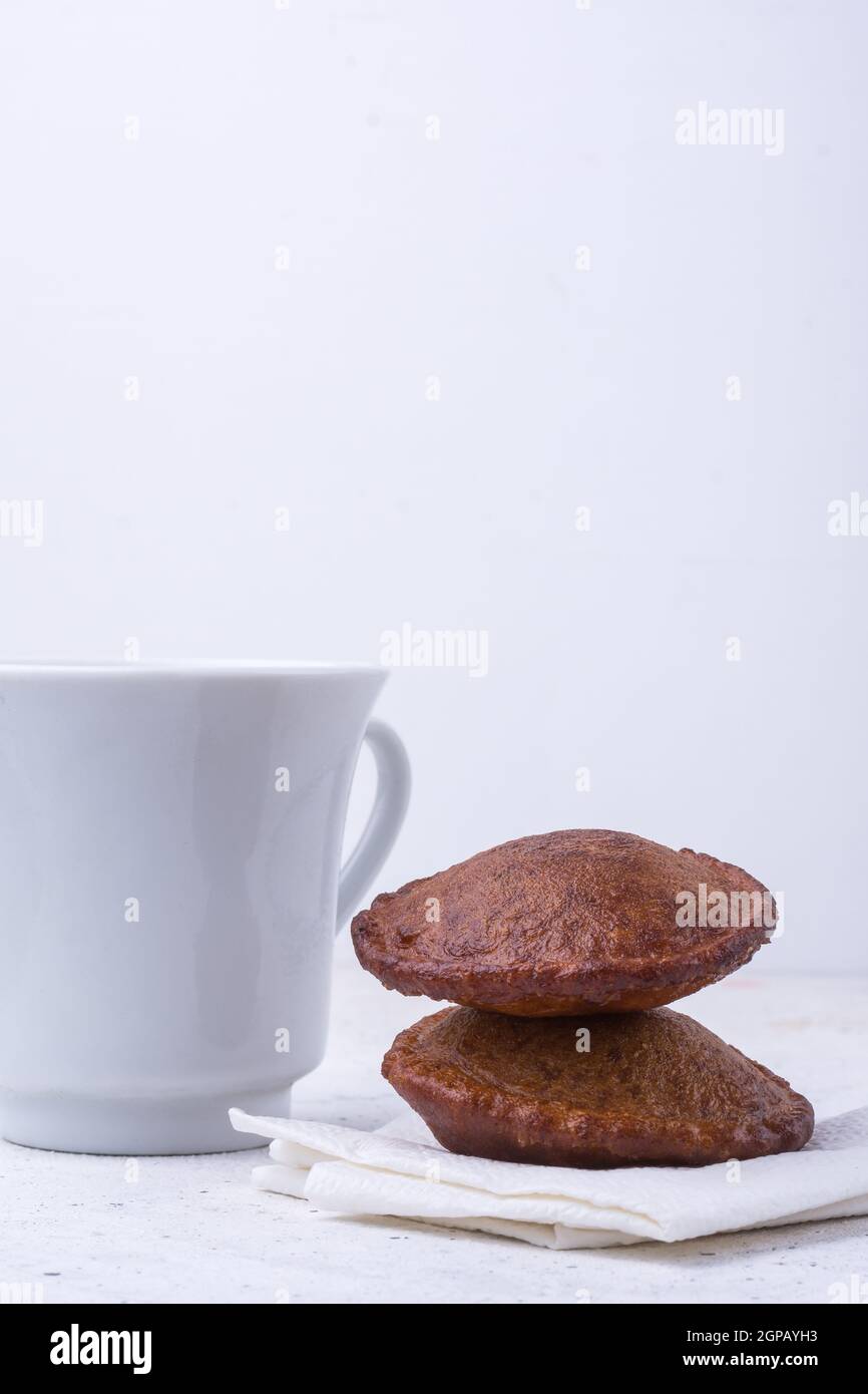 deep fried sri lankan sweet called kevum or kavum, traditional dessert ...