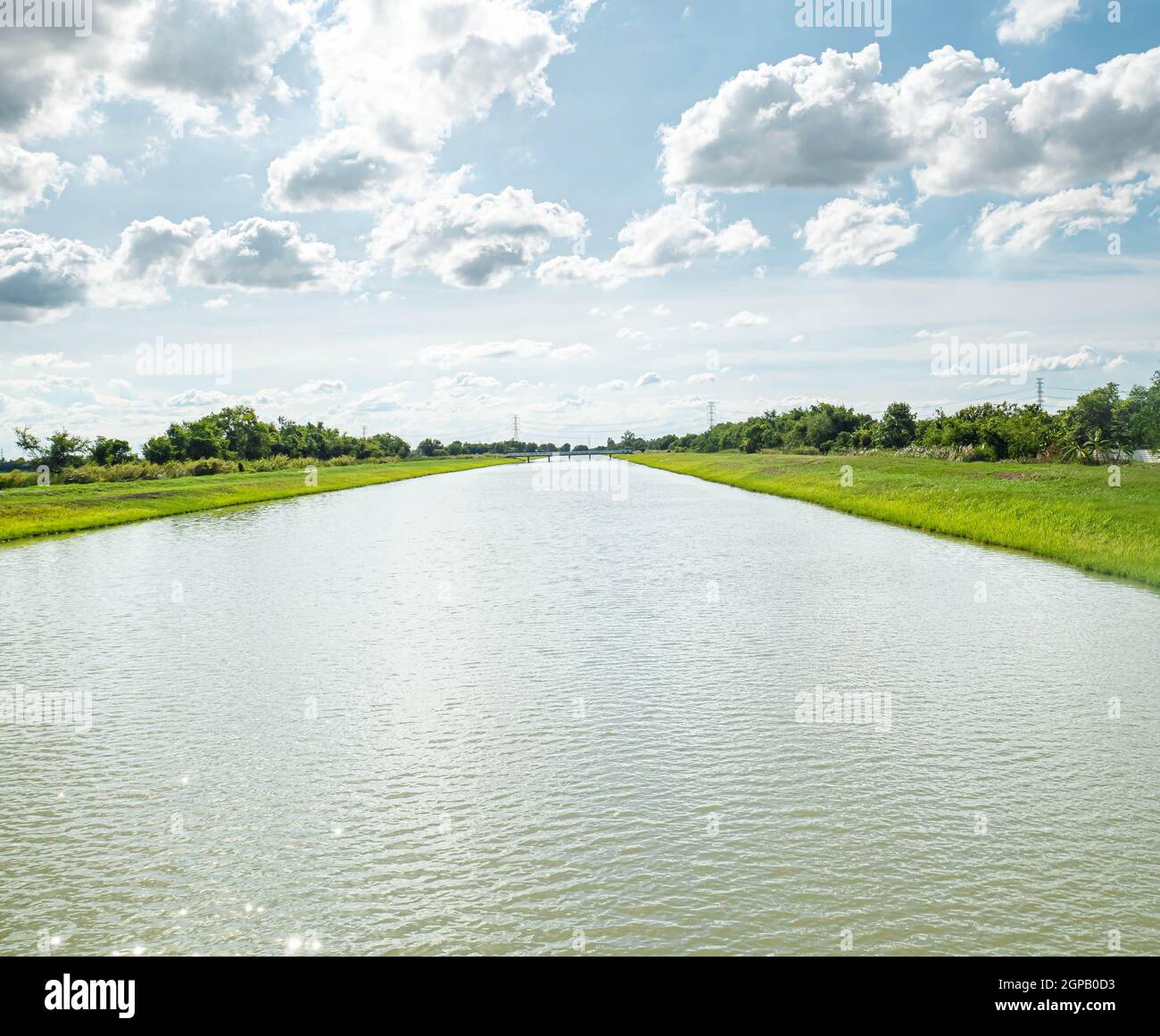 Water conveyance and distribution canals .An irrigation canal with a ...