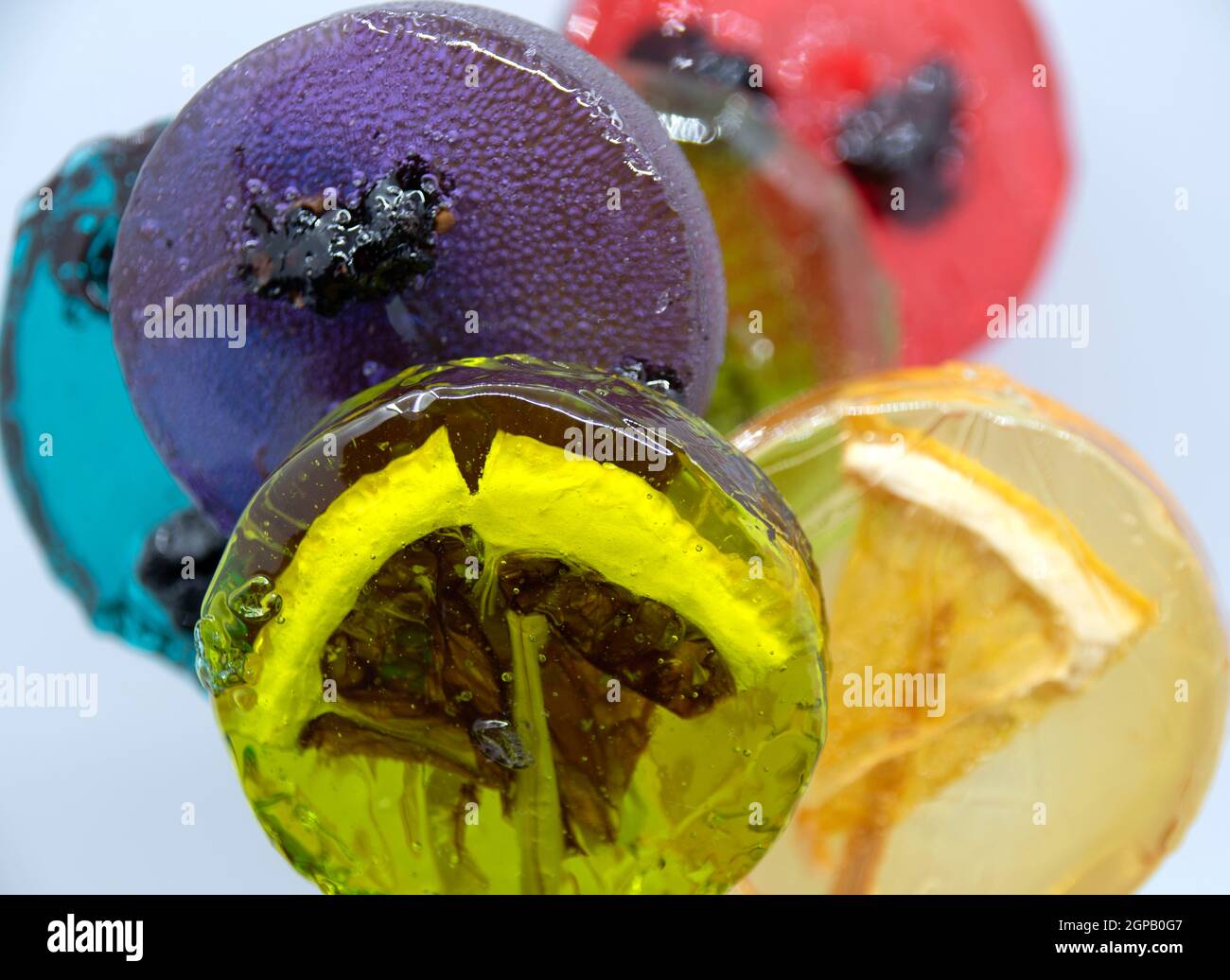 Fruit lollipops with different berries and fruits inside close-up Stock ...