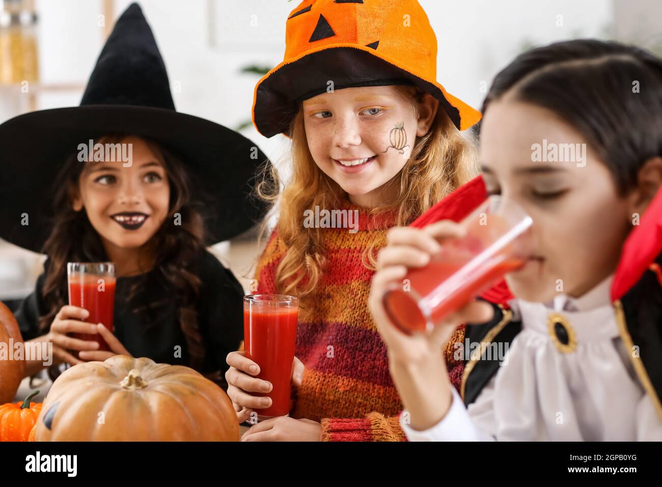 Cute little children celebrating Halloween at home Stock Photo - Alamy