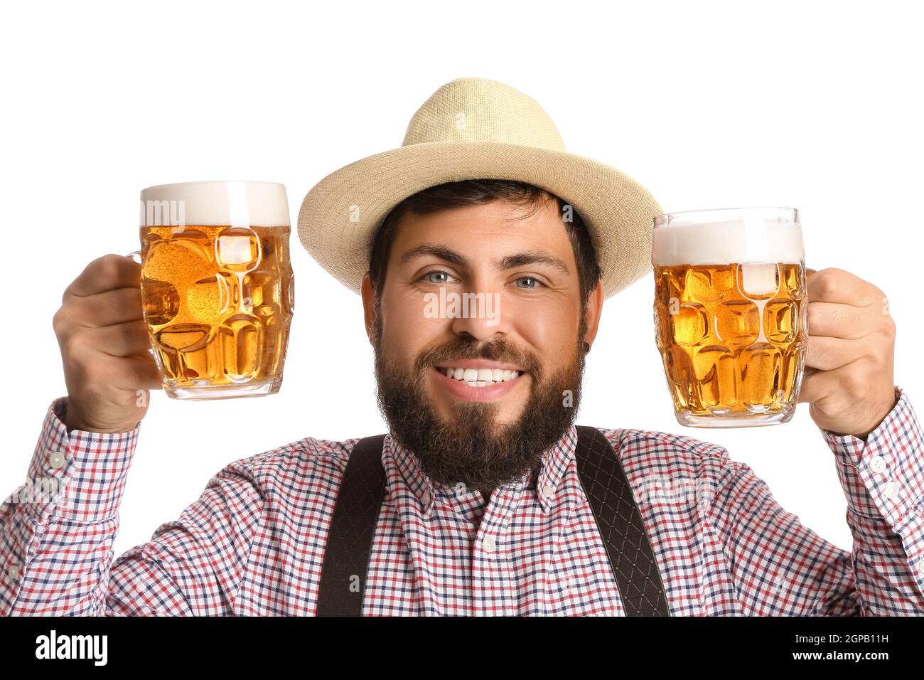 Handsome man in traditional German clothes and with beer on white ...