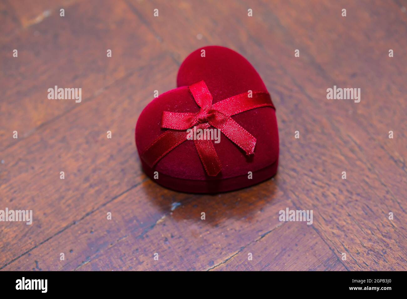 Wedding rings in a beautiful red box Stock Photo - Alamy