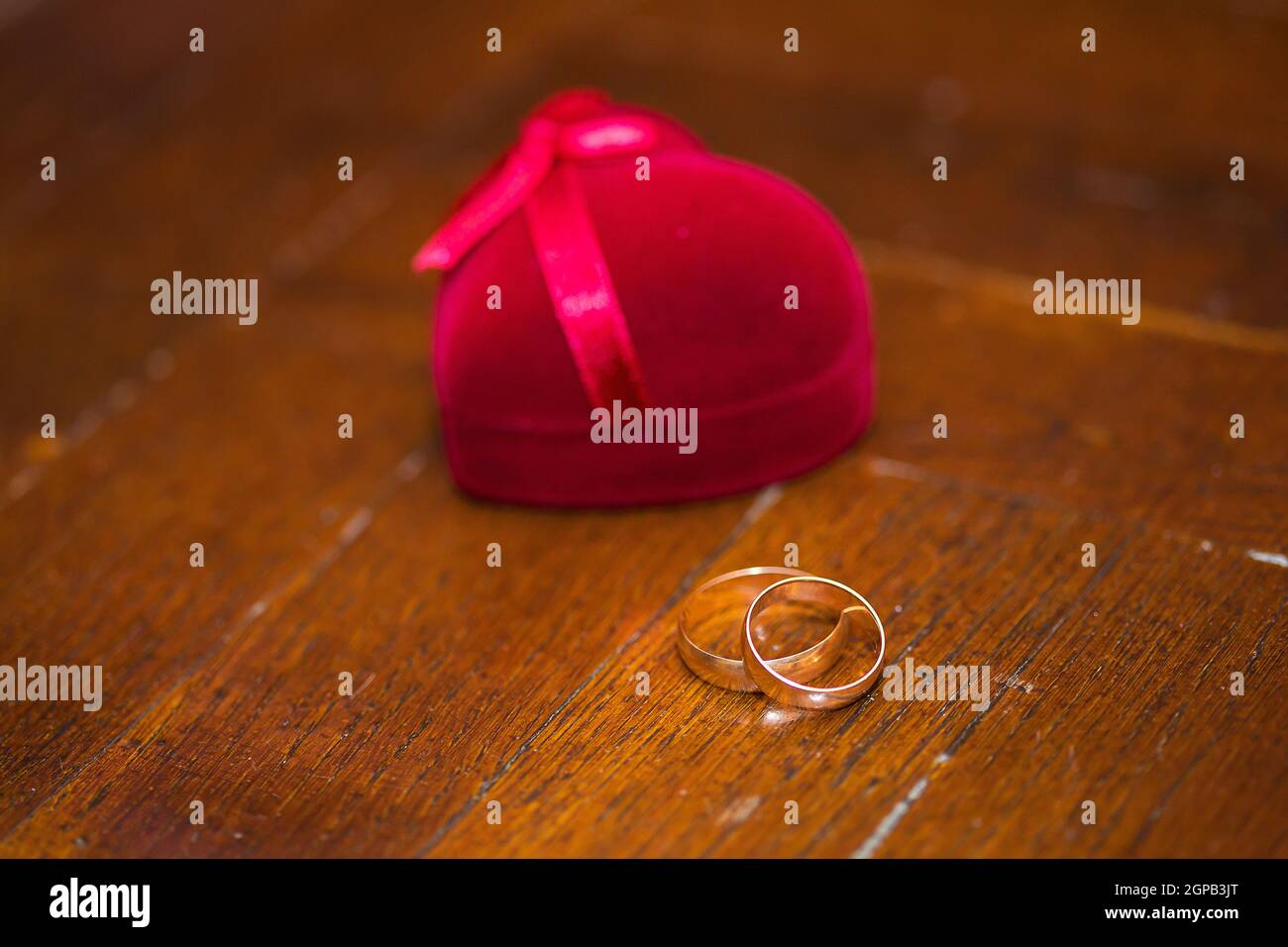 Wedding rings in a beautiful red box Stock Photo - Alamy