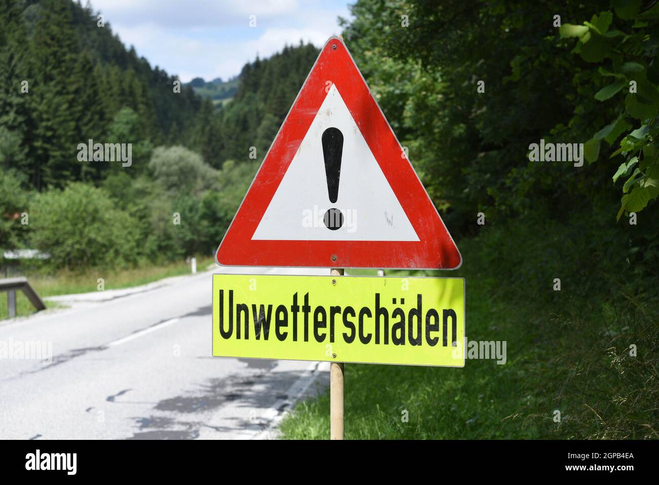 a storm damage warning sign, road sign on the street Stock Photo - Alamy