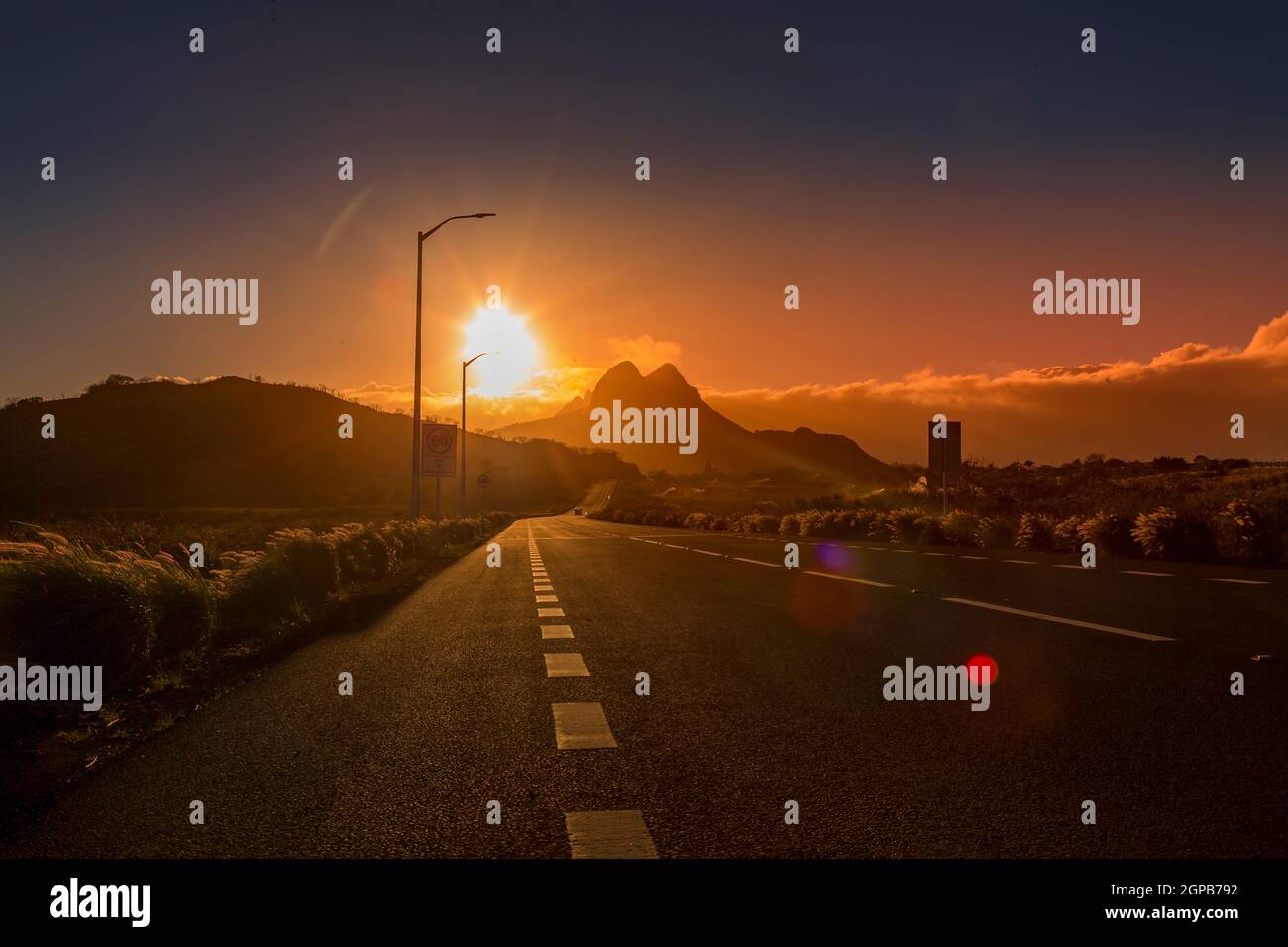 sunrise over the highway Stock Photo - Alamy