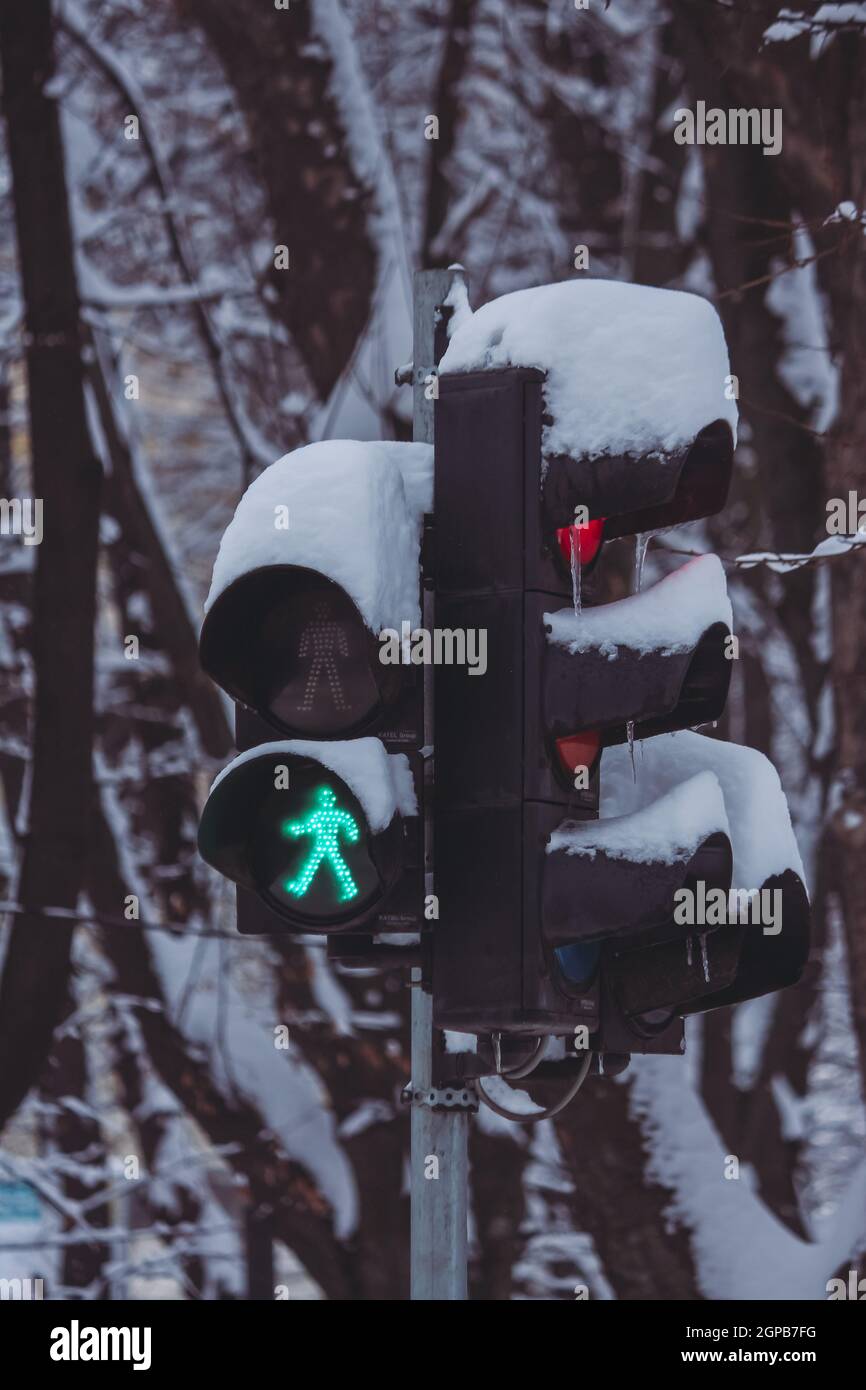 Stoplight for pedestrians and cars during winter Stock Photo - Alamy