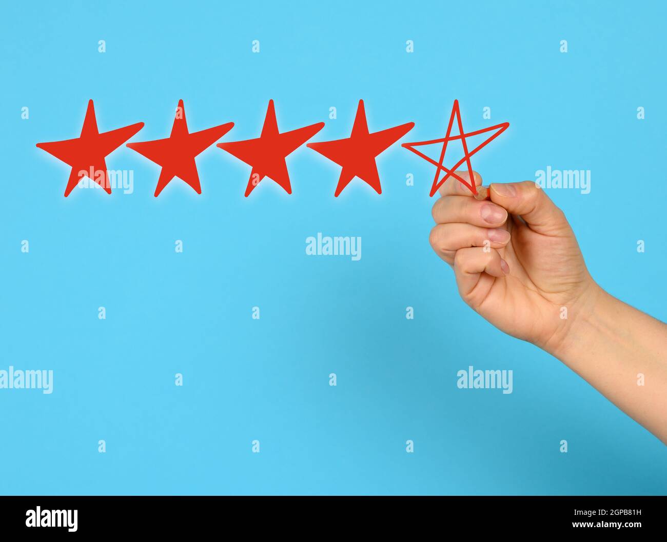 score five red stars and a female hand draws on a blue background, high ...