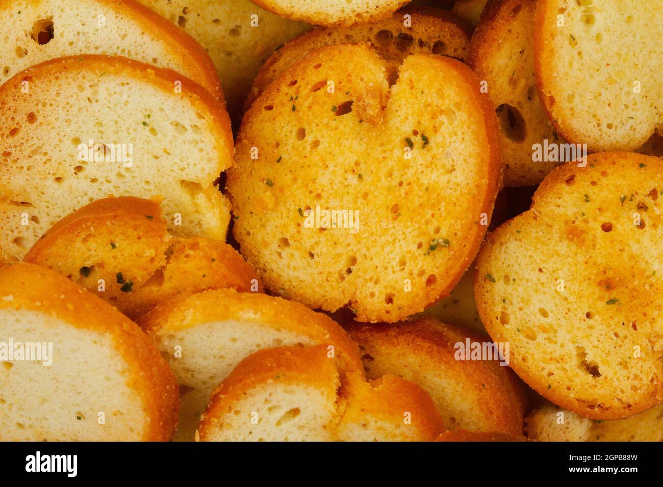 top view closeup of many round bread roasted crusty bruschetta with ...