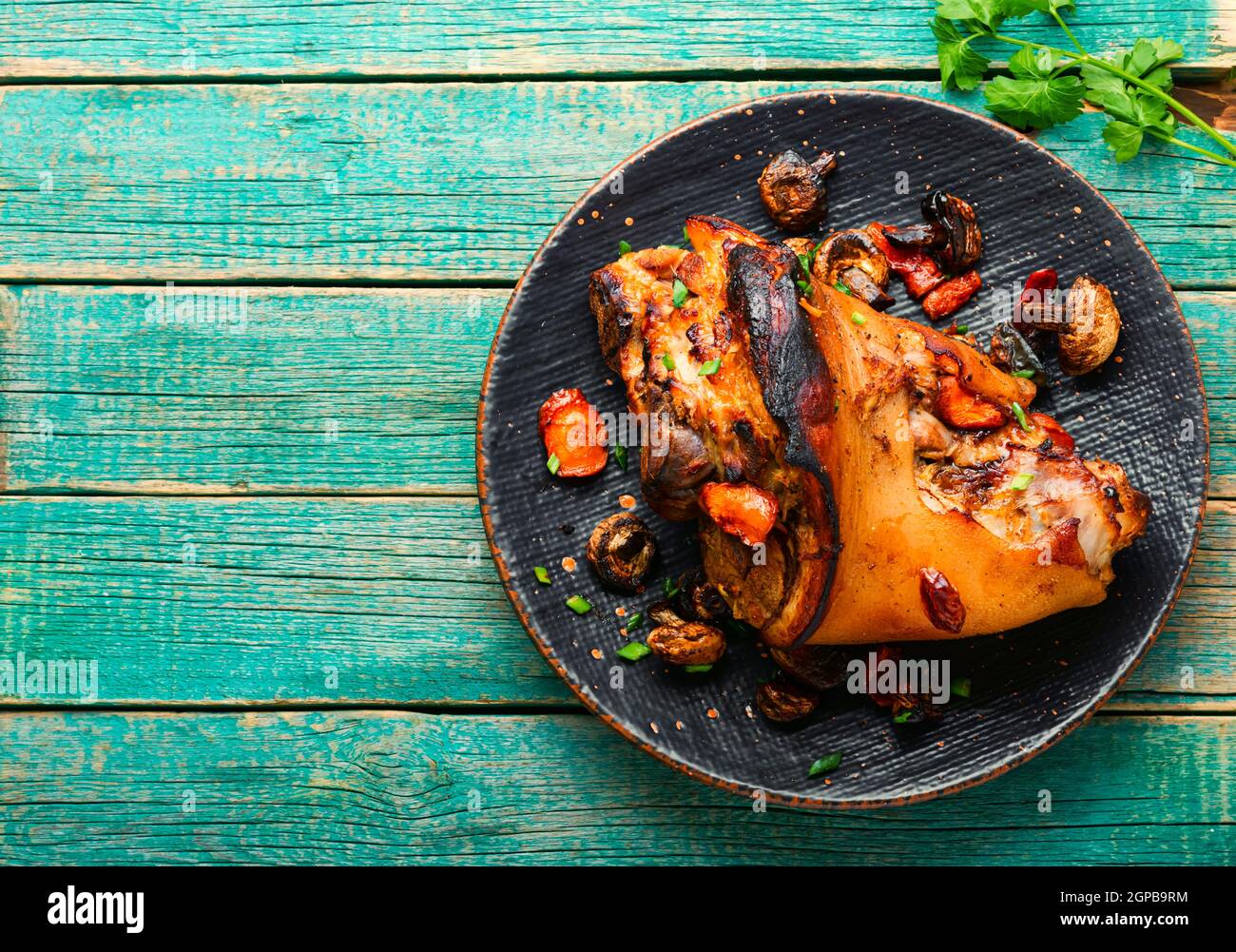 German cuisine meat dish of pork leg and pork knuckle.Baked eisbein ...