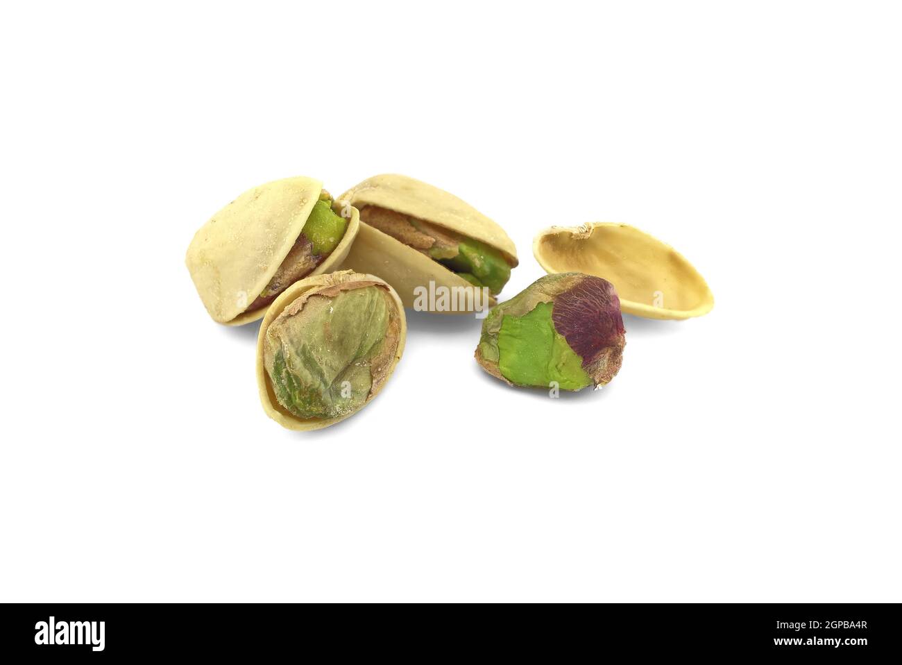 Pile of roasted and salted pistachios nuts isolated on white background Stock Photo - Alamy