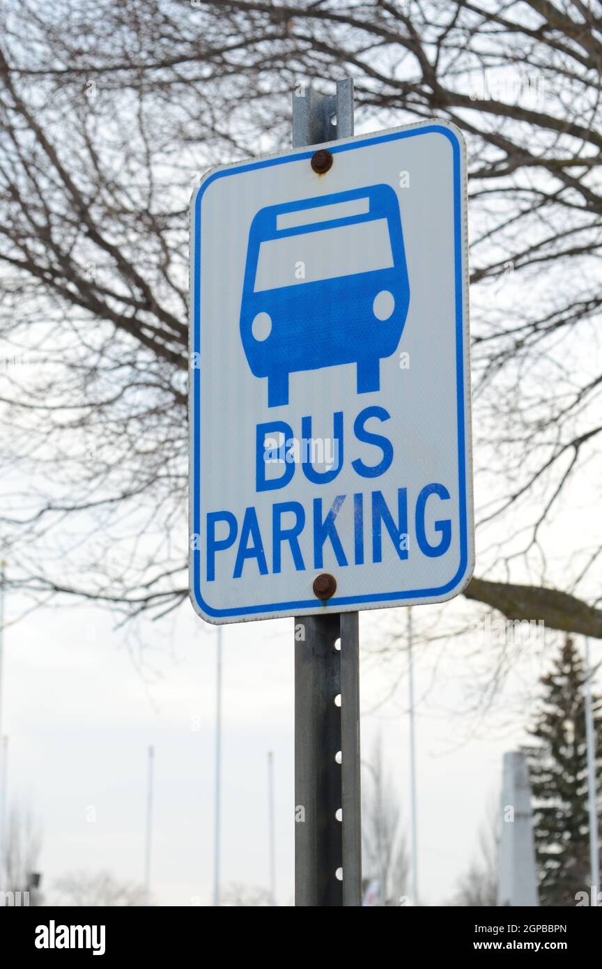 A roadside bus parking sign for designated areas in the local community ...