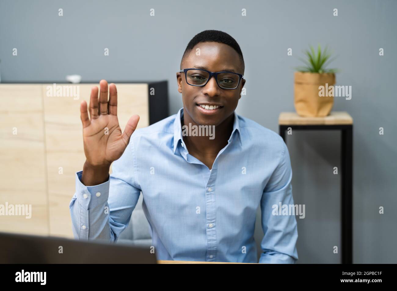 African American Black Man Virtual Interview Waving To Webcam Stock ...
