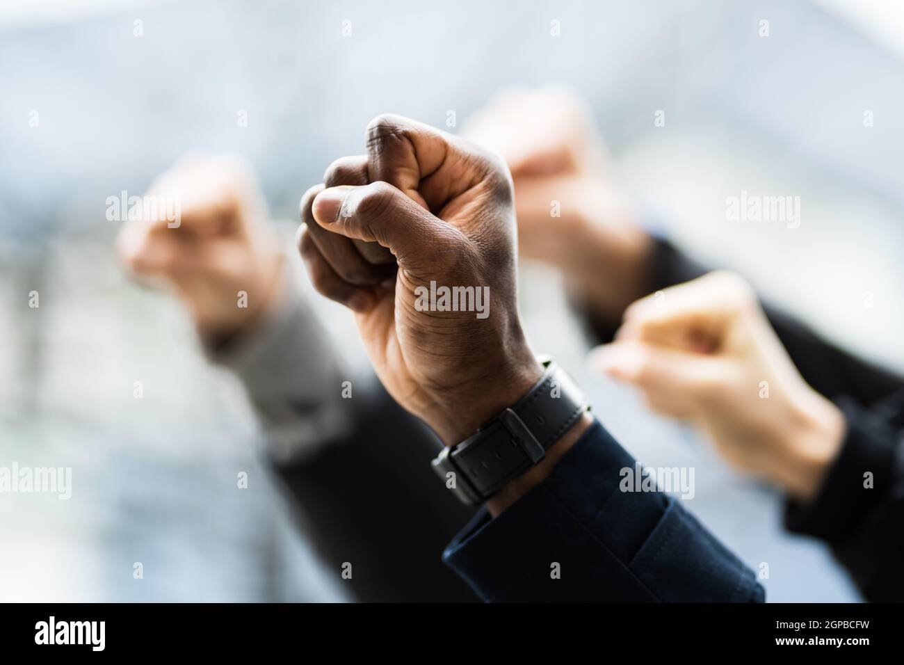 Woman protesting fist hi-res stock photography and images - Alamy