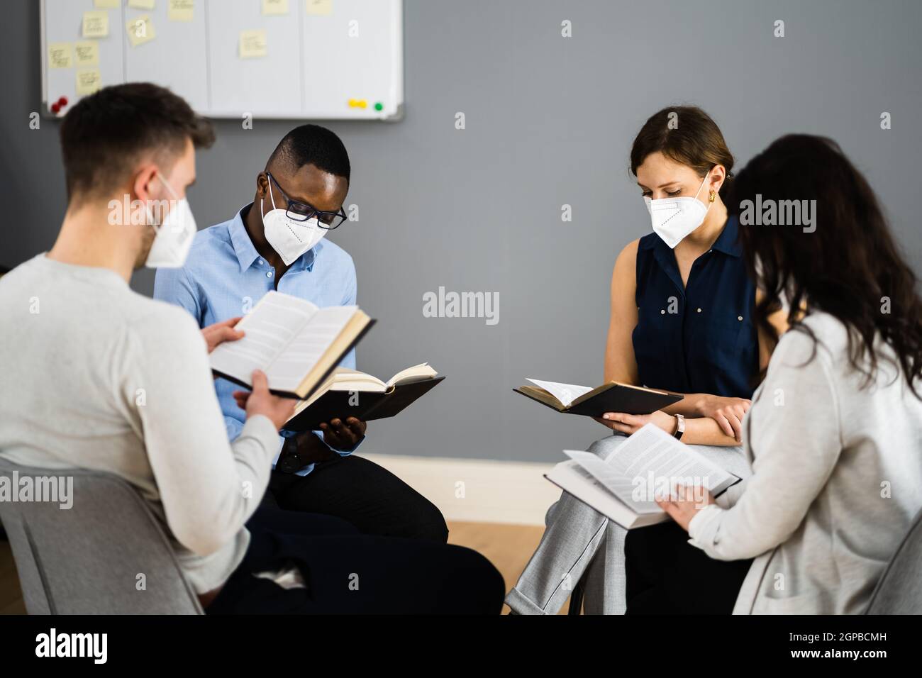Group Bible Study And Discipleship. People Reading Stock Photo - Alamy