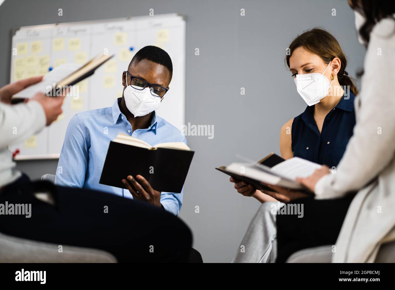 Group Bible Study And Discipleship. People Reading Stock Photo - Alamy