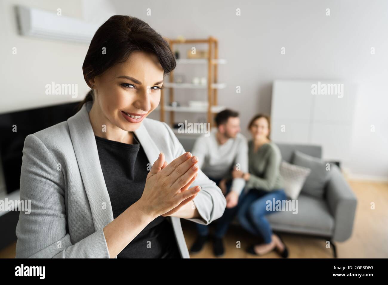 Deceitful Lying Salesman Lying To Family Couple Stock Photo - Alamy