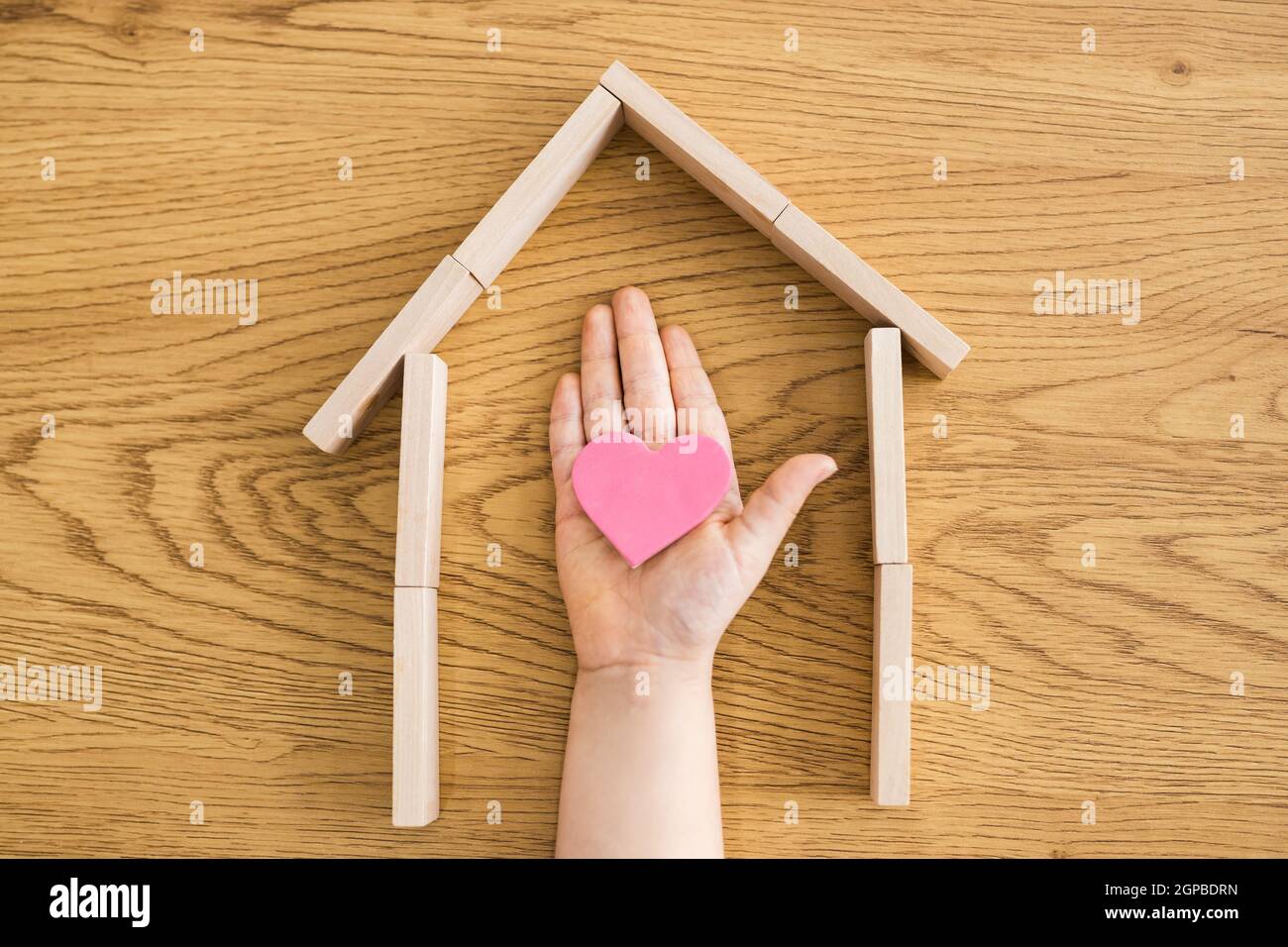 Home Real Estate Concept Hand Holding Heart Stock Photo - Alamy
