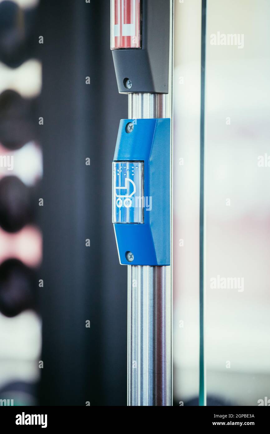 Blue baby carriage button in a bus, commuting, public transport Stock ...