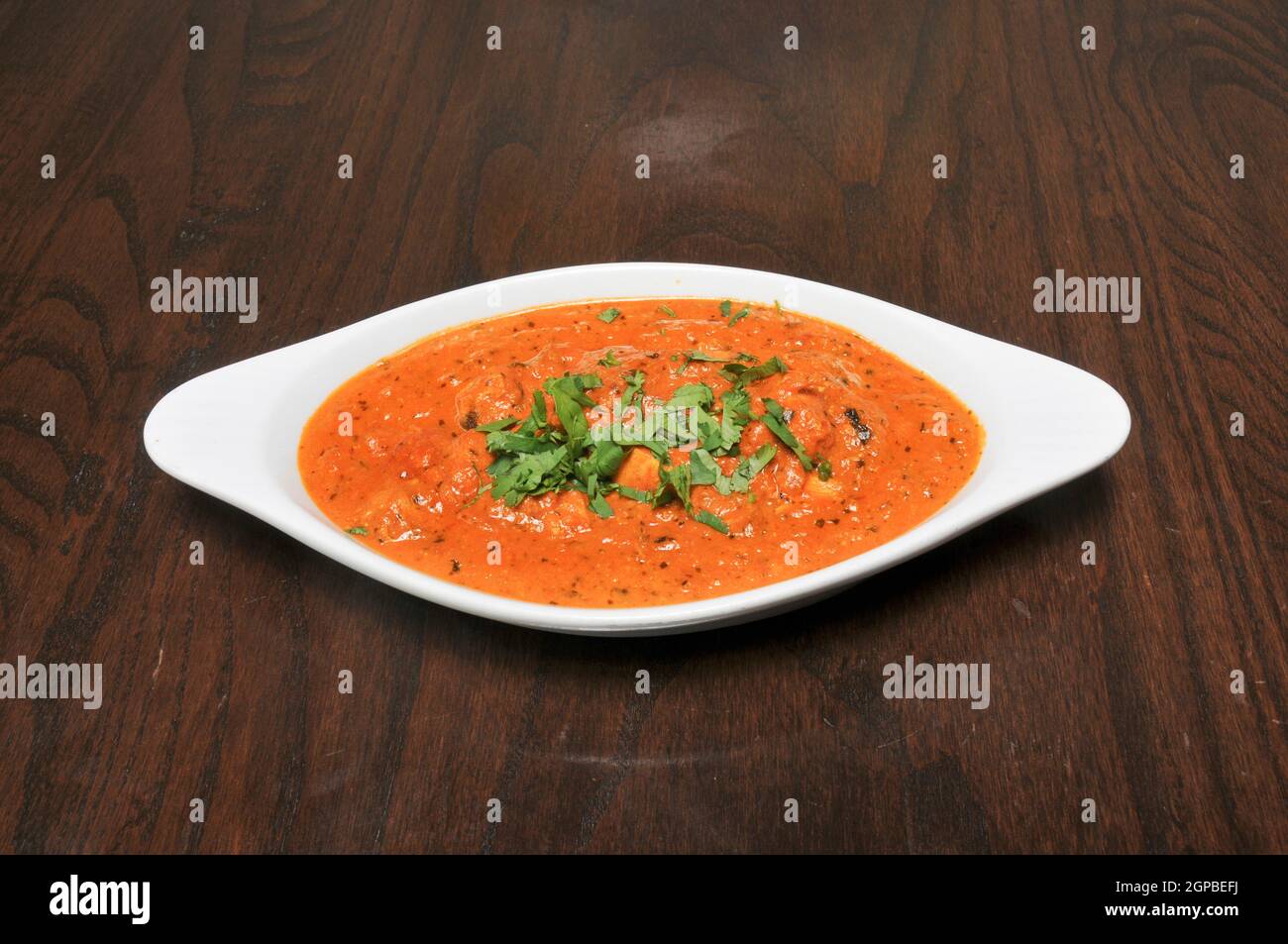 Delicious Indian dish known as chicken tikka masala Stock Photo - Alamy